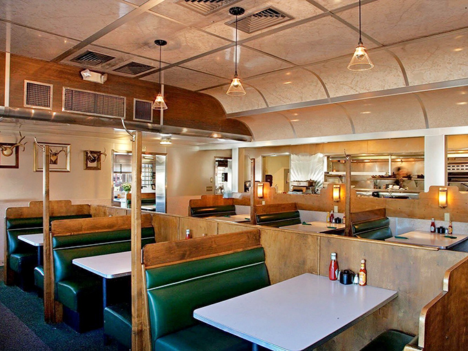 Teal vinyl booths invite you to slide in and stay awhile, where every table feels like the best seat in the house.