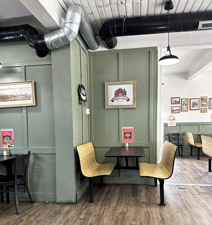 Modern industrial touches blend with cozy seating nooks, creating spaces where lingering over coffee feels not just allowed but encouraged.