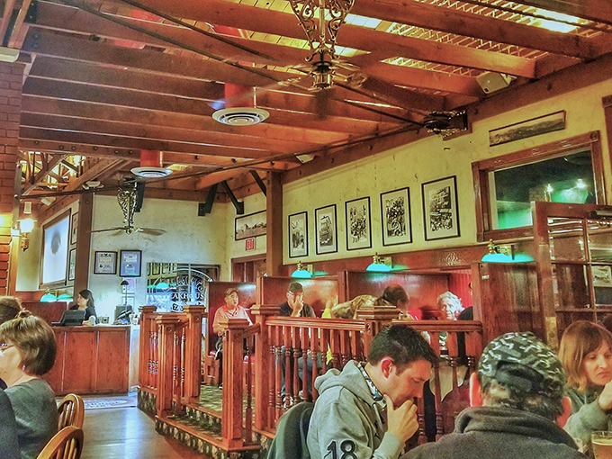 Wooden booths that have witnessed more celebrations than a wedding photographer. This dining room doesn't just serve meals&mdash;it collects stories.