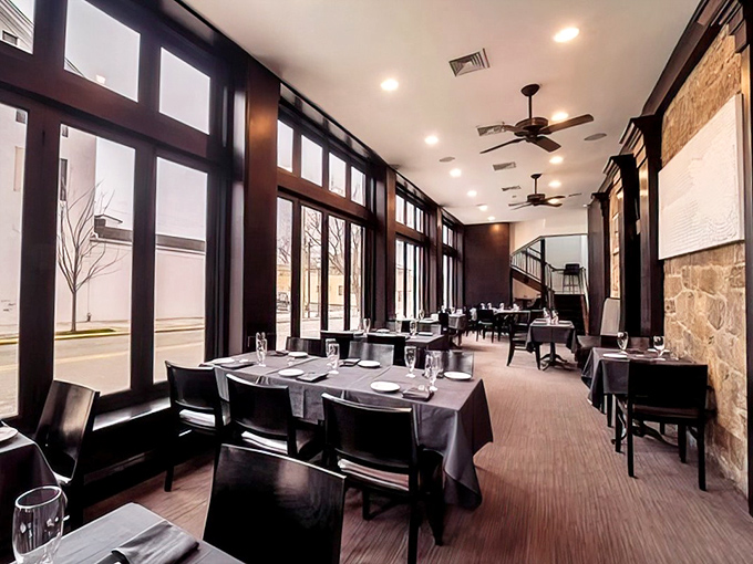 Sunlight streams through tall windows, illuminating a dining room that manages to be both sophisticated and welcoming&mdash;like your fanciest friend who still loves pizza night.