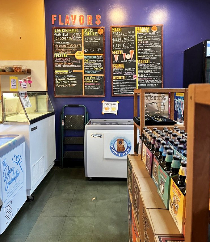 The menu wall—where dreams are catalogued and decisions become deliciously difficult. Note the "Puppy Pops" for four-legged friends!