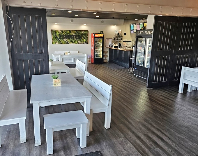 Clean lines, white benches, and the promise of imminent deliciousness. The calm before the storm of flavors that's about to hit your taste buds.