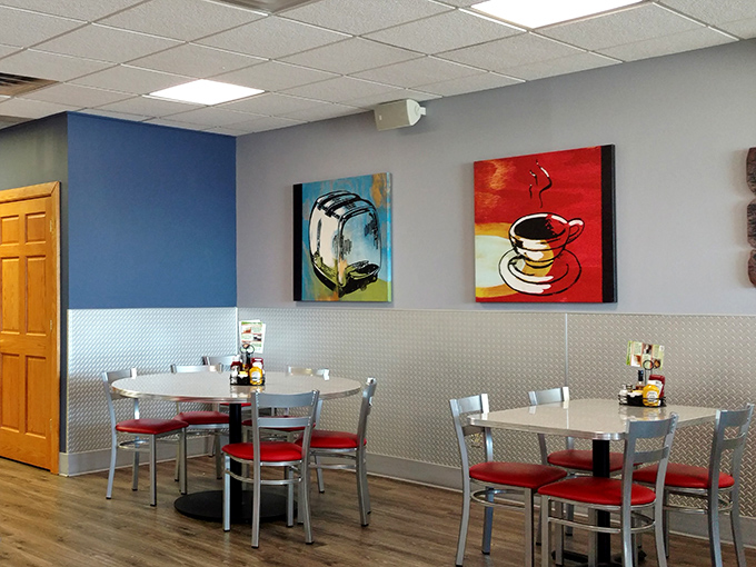 Whimsical food-themed artwork adds personality to the dining space. Those paintings aren't just decoration&mdash;they're visual appetizers.