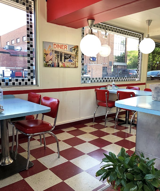 The quiet elegance of diner seating &ndash; where every table offers a front-row view to downtown Columbia and passing conversations.