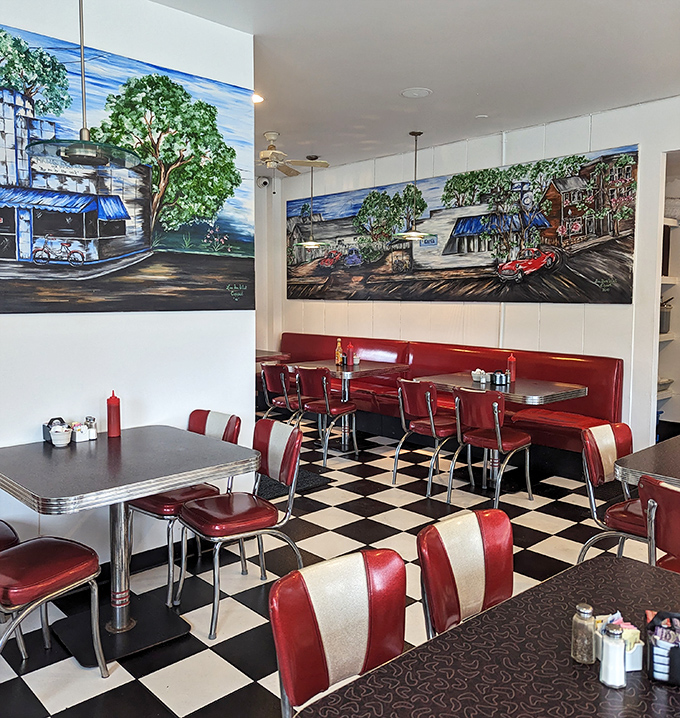 Those vintage-style booths aren't just seating—they're front-row tickets to the greatest show on earth: small-town America having breakfast.