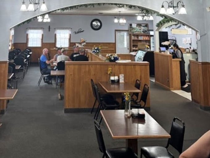 The dining room where wood paneling and scenic murals create Ohio's answer to fine dining.