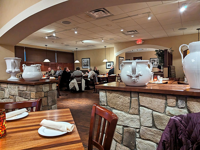 Stone accents, warm lighting, and comfortable seating &ndash; the dining room feels like the living room of that Italian friend who really knows how to cook.