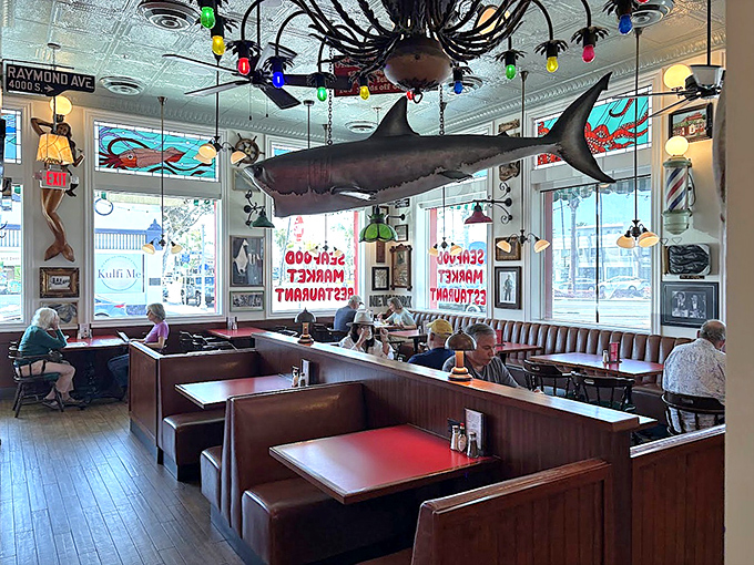 The suspended shark watching over diners seems to say, "You made the right choice coming here." Those wooden booths have witnessed countless celebrations and everyday joys.