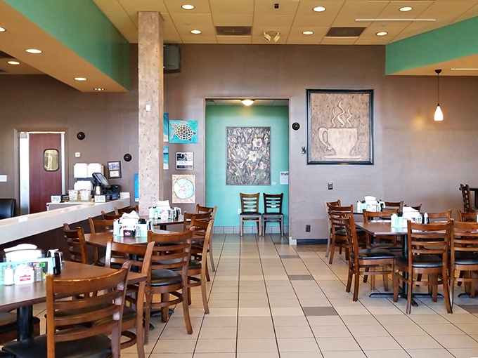 Coastal cool meets breakfast comfort in this dining area, where turquoise walls and coffee aromas create the perfect vacation morning vibe.