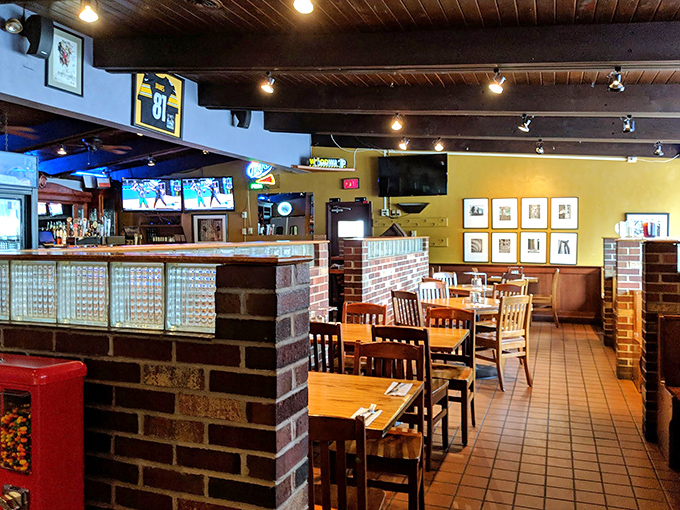 Warm wood tones and yellow walls create a space that feels both contemporary and timeless, like your favorite pair of broken-in jeans.
