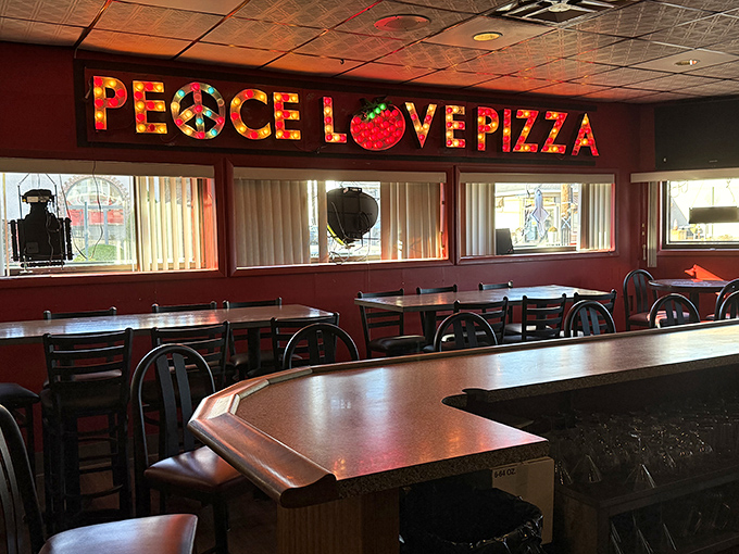 "Peace Love Pizza" isn't just a slogan&mdash;it's a way of life at Revello's, where the stained-glass sign illuminates a philosophy we can all get behind.