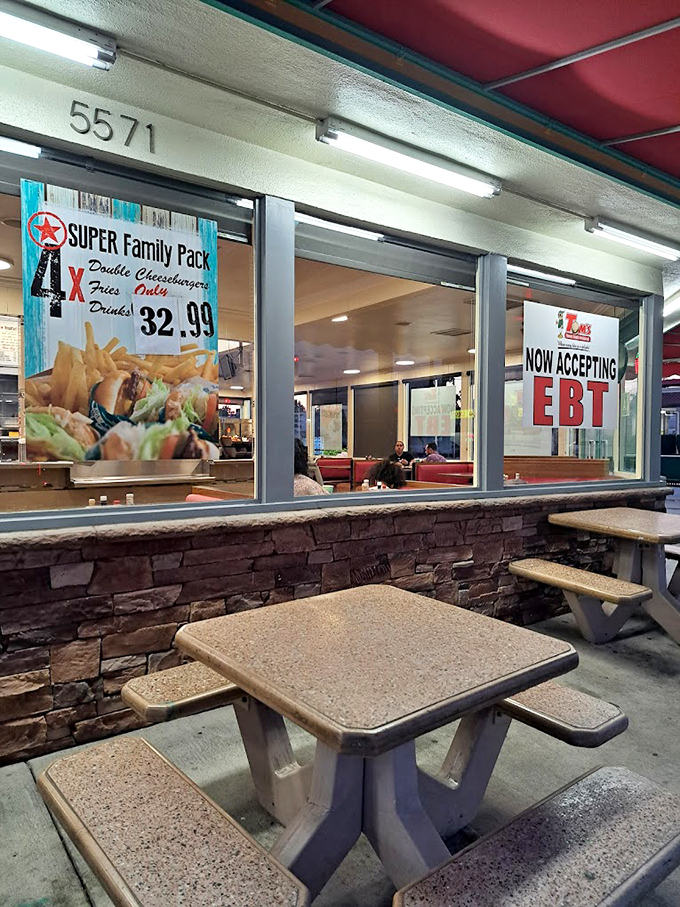 Outdoor seating where you can enjoy your feast while watching the world go by. The stone facade adds a touch of permanence to quick meals.