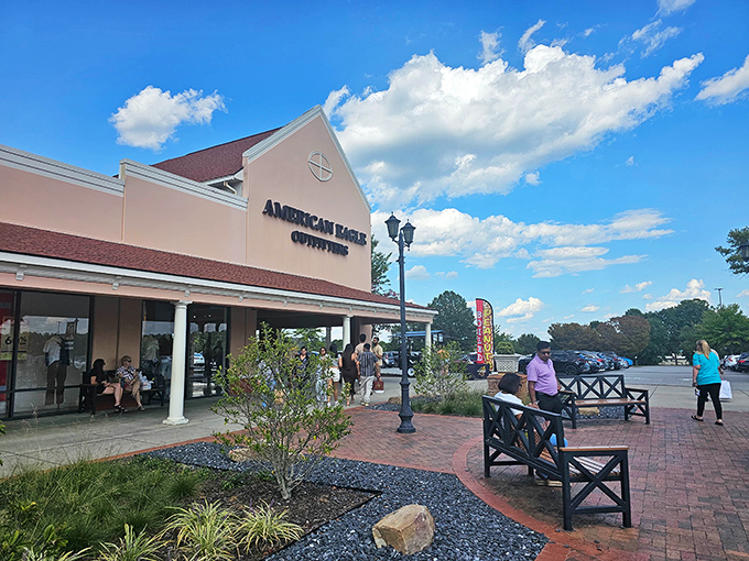 American Eagle's welcoming storefront offers a moment of retail respite, complete with outdoor benches for those crucial mid-shopping expedition breaks.