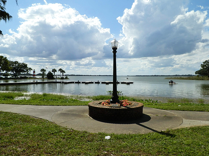 A vintage lamppost stands sentinel at Palm Island Park's lakefront. Quiet moments like this are Mount Dora's specialty, no admission ticket required.