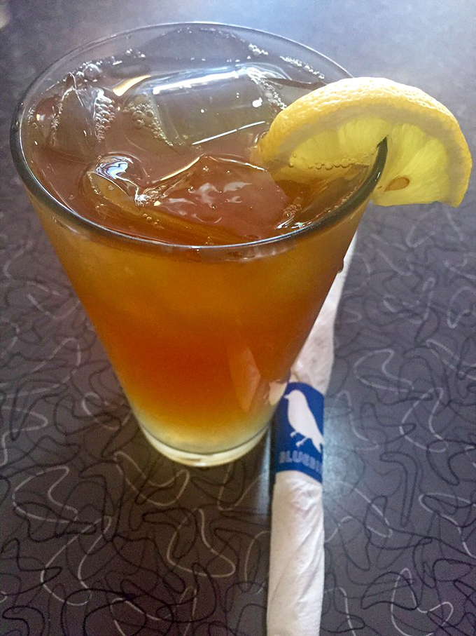 That iced tea isn't just refreshing&mdash;it's Iowa summer in a glass, complete with a lemon slice that's not just garnish but necessary punctuation.