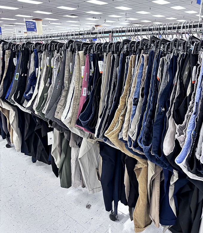 The pants parade! Every length, style and size imaginable hangs in neat rows, waiting for their perfect match.