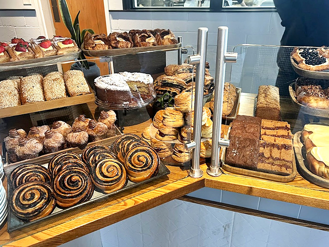 Pastry paradise in plain sight. Those cinnamon rolls front and center are the celebrities here, with a supporting cast of equally tempting treats.