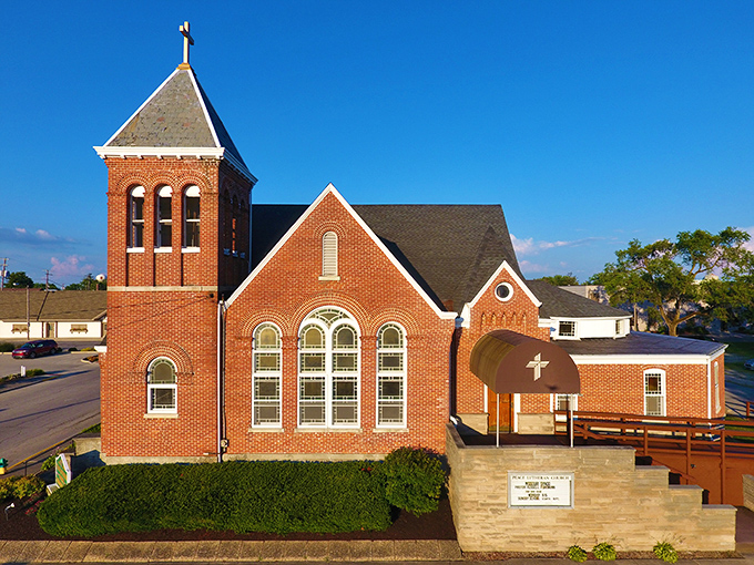 Faith and Swiss design unite in this beautiful brick church. The steeple reaches skyward as if trying to touch those famous Swiss Alps.
