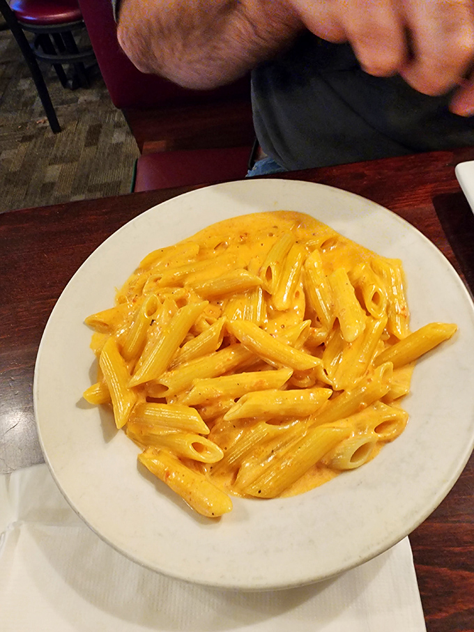 Sometimes pasta just needs to be itself &ndash; no fancy additions, just perfectly cooked penne embraced by a vodka sauce that whispers, "Everything's going to be okay."