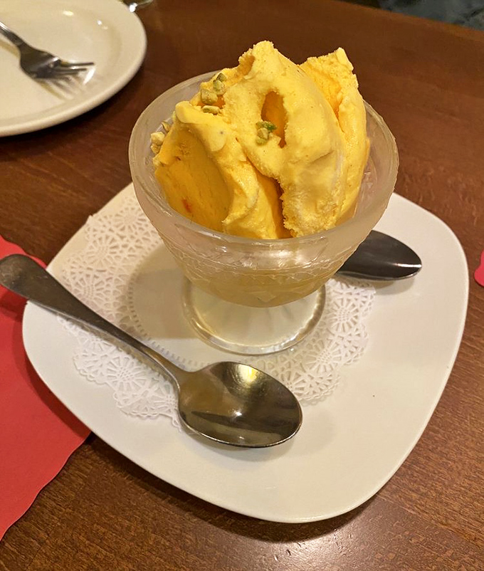 Saffron ice cream that tastes like sunshine and luxury. Those pistachios aren't just garnish&mdash;they're exclamation points at the end of a perfect meal.