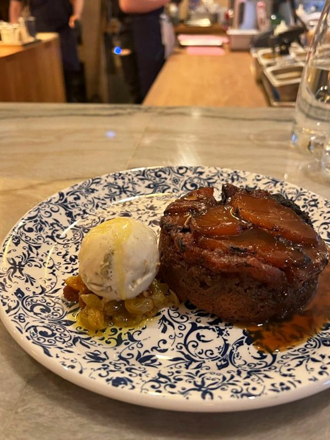 This isn't just dessert, it's time travel to the best childhood memory you never had. Caramelized pineapple crowns a cake that demands your full attention.