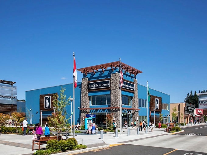 The Polo Ralph Lauren flagship stands tall, a two-story temple to preppy perfection where the little horse emblem carries a much smaller price tag. 