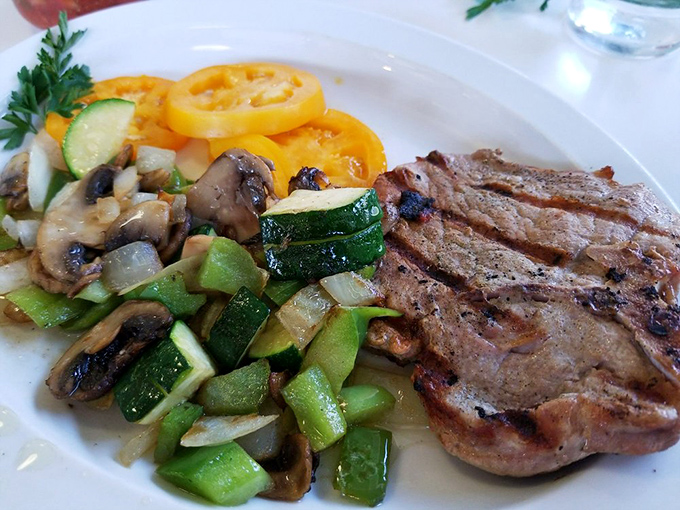 This pork chop with saut&eacute;ed vegetables isn't just lunch&mdash;it's what happens when breakfast ingredients grow up and get sophisticated.