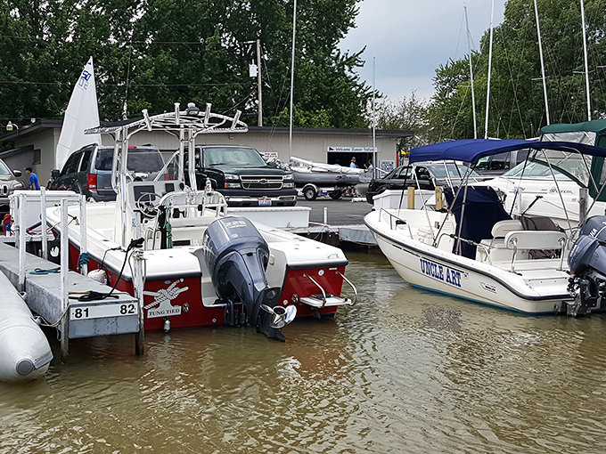 The yacht club scene – where "yacht" might be a generous term, but the camaraderie is as genuine as the fish stories being swapped.