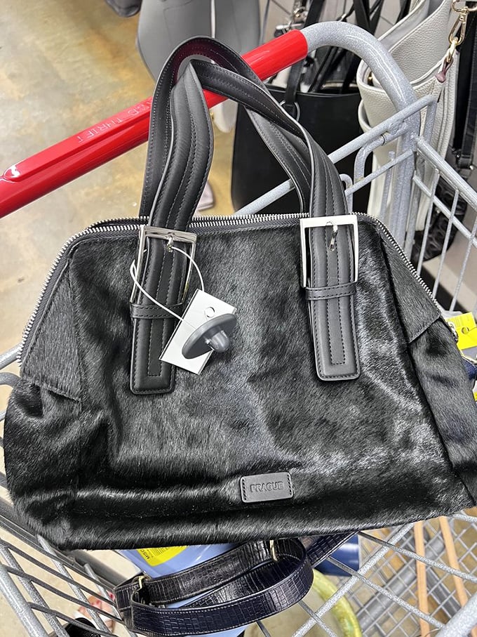 A Prague handbag waiting for its second act. Yesterday's luxury becomes today's steal with that yellow price tag.