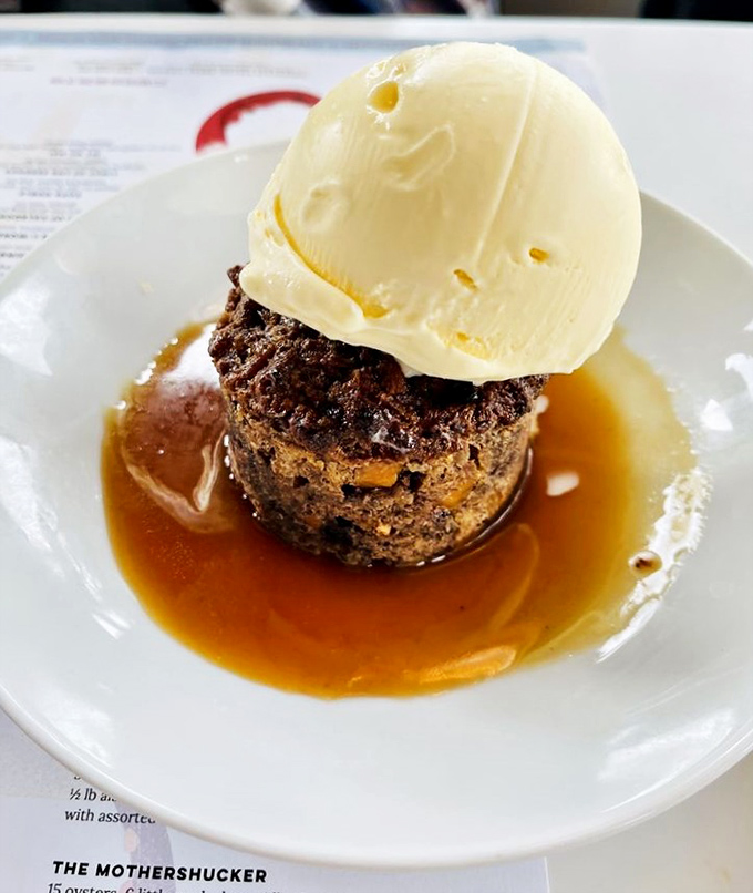 Bread pudding elevated to an art form. That scoop of vanilla ice cream slowly melting into warm chocolate pretzel goodness is pure theater on a plate.