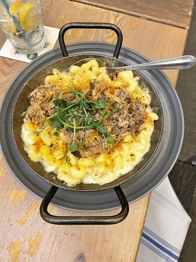 Pulled pork mac and cheese that would make your cardiologist wince and your taste buds send thank-you notes.