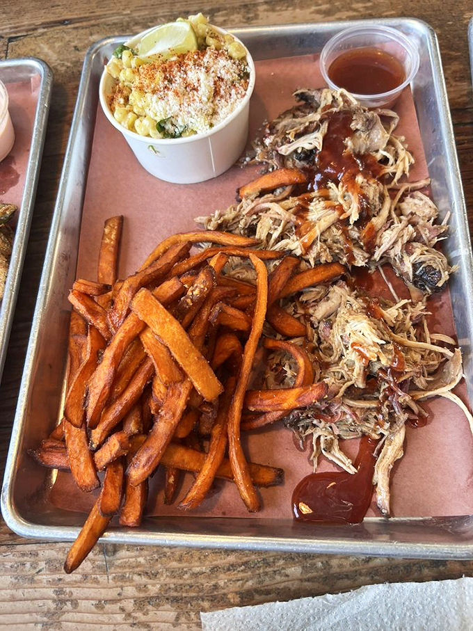 Pulled pork with sweet potato fries&mdash;a relationship that works so well it should write a book on compatibility.