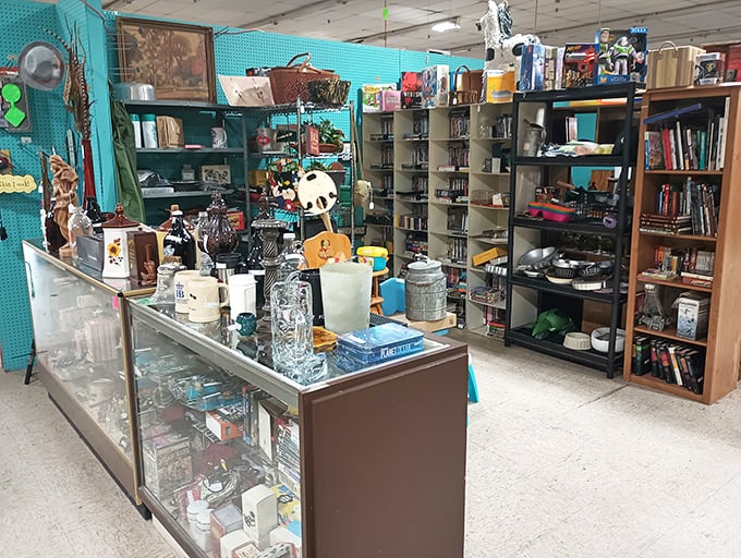 Behind that glass counter lies yesterday's treasures waiting for tomorrow's homes. The turquoise pegboard backdrop makes every vintage trinket pop.