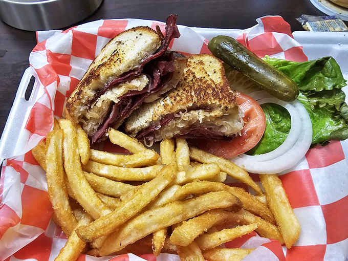 The Reuben sandwich – architecture you can eat, with a pickle standing guard to ensure you don't forget your vegetables.
