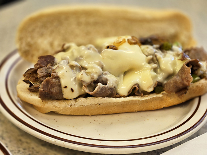 The Philly cheesesteak's Midwestern cousin &ndash; tender ribeye smothered in melted cheese on a soft roll. No passport required for this cross-country flavor journey.