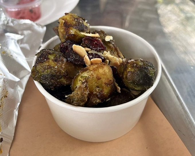 Brussels sprouts that could convert even the most dedicated vegetable skeptic. Roasted to caramelized perfection with what appears to be a sprinkle of nuts.