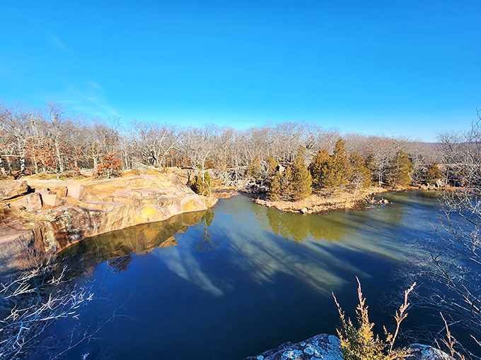 Winter reveals a different side of Elephant Rocks, with still waters perfectly mirroring the rugged landscape in nature's own infinity pool.