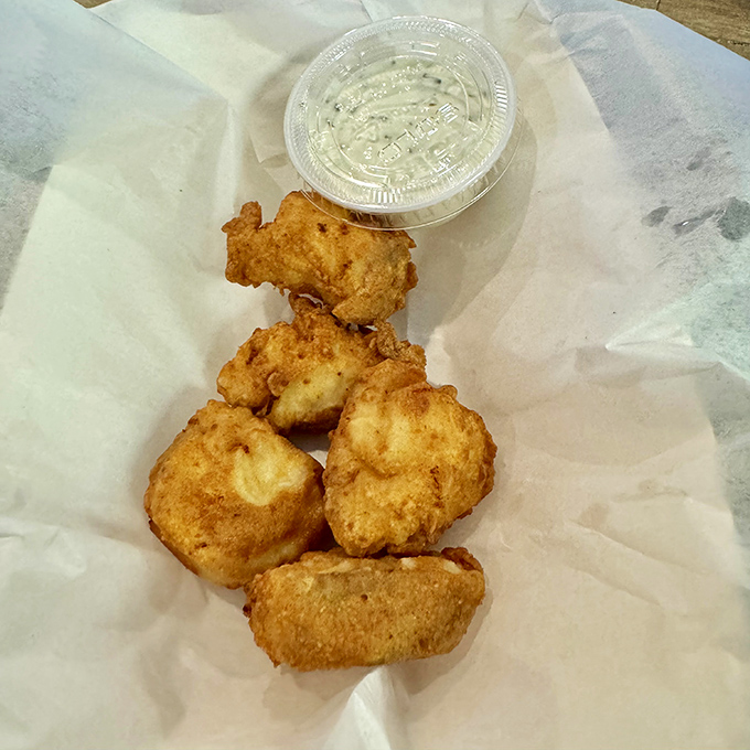 Rockfish bites that capture Maryland's state fish in its most snackable form. These golden morsels disappear faster than weekend parking spots.