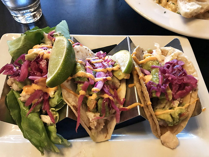 Rockfish tacos dressed for success with vibrant slaw and zesty sauce&mdash;a coastal vacation wrapped in a tortilla.