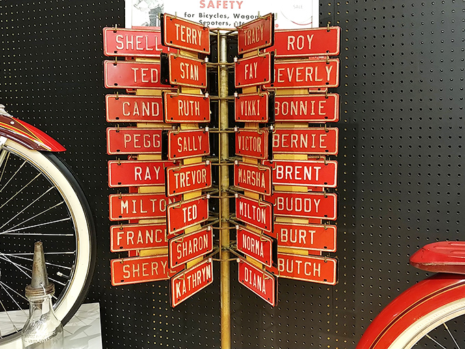 The personalized license plate display spins with names from a bygone era&mdash;when "Butch" and "Milton" were cool kid names and your bike plate was a status symbol.