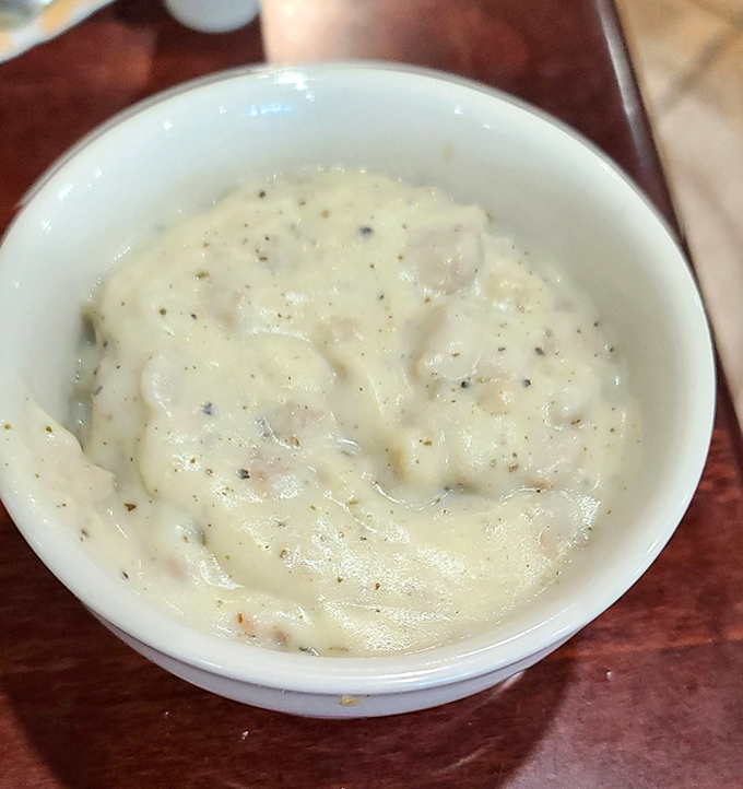 Sausage gravy thick enough to stand a spoon in &ndash; the kind that makes biscuits weep with pure joy.
