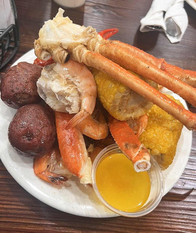 A seafood boil feast fit for Neptune himself, complete with corn and all the buttery goodness imaginable.