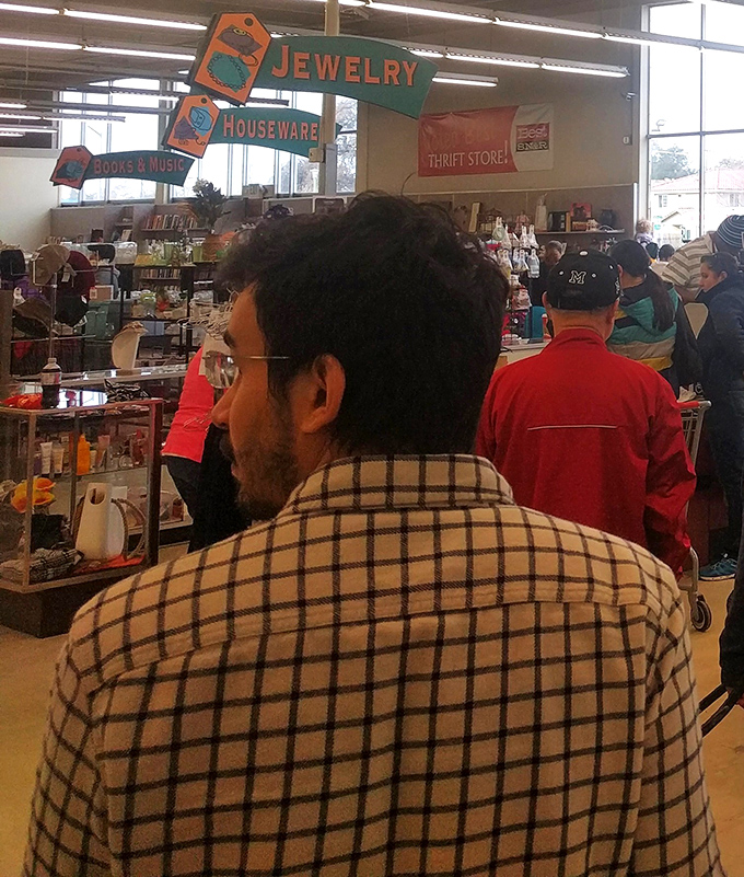 Fellow treasure hunters navigate aisles like seasoned explorers mapping uncharted retail territories together.