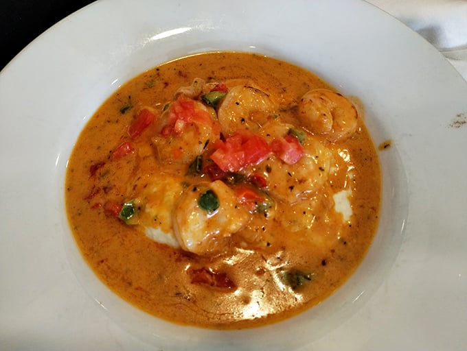 Shrimp and grits: where coastal comfort meets breakfast brilliance in a bowl that proves Florida knows its way around morning cuisine.