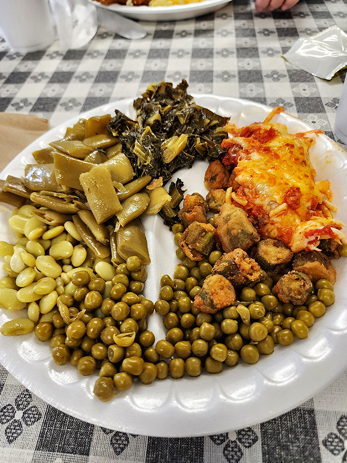 A plate that tells the story of the South&mdash;collards, lima beans, peas, and cornbread croutons that deserve their own fan club.