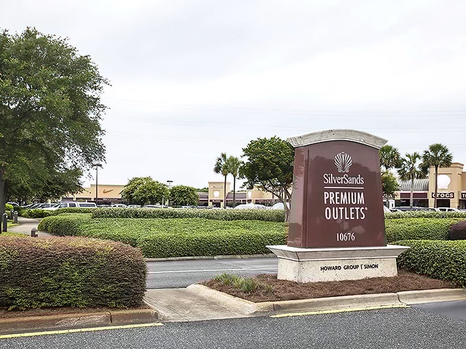 The understated entrance sign welcomes you to what locals know is Florida's retail promised land. Your credit card is already tingling with anticipation.