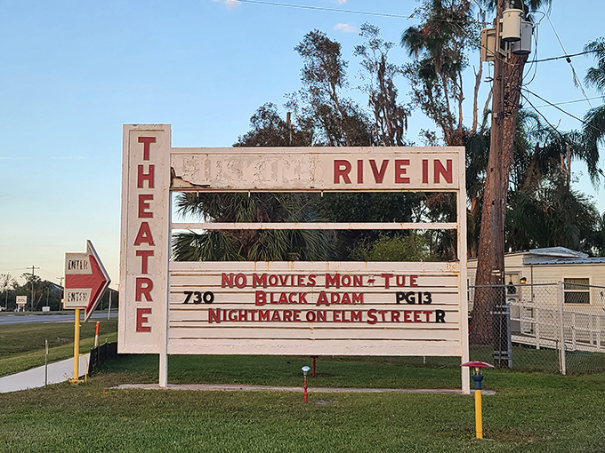 "No Movies Mon-Tue" announces the weathered sign. In the streaming era, this physical movie schedule feels refreshingly tangible.