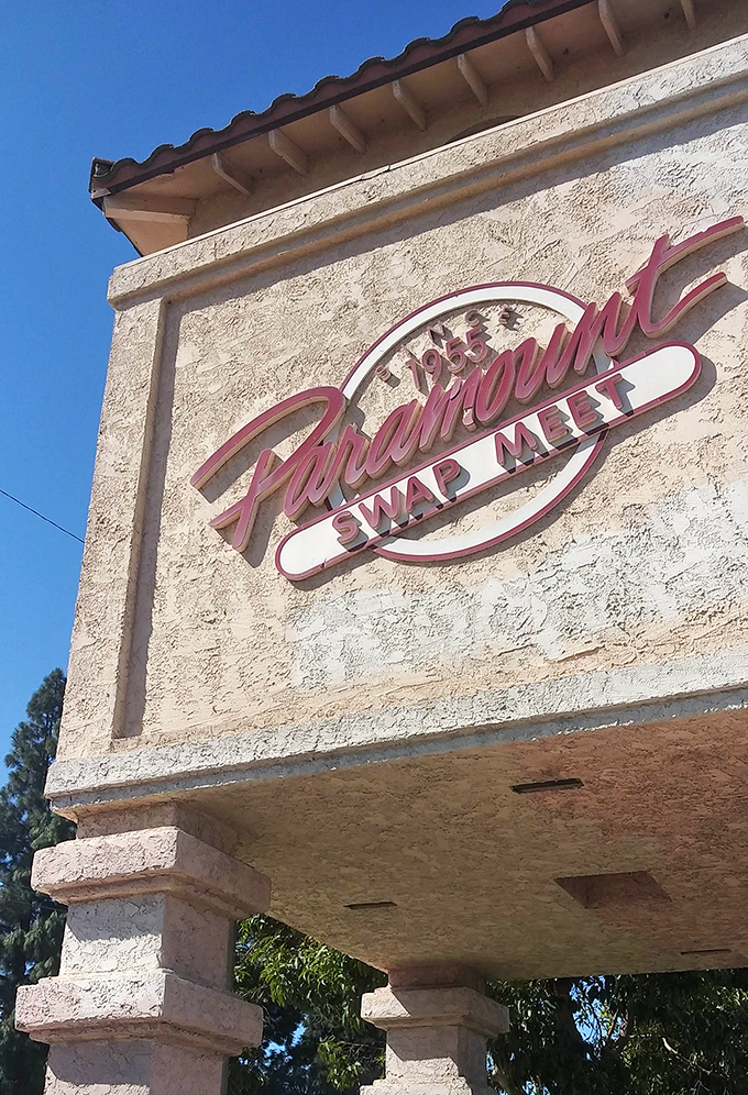 The iconic Paramount Swap Meet sign welcomes bargain hunters. Like the Hollywood sign, but for people with practical spending habits.