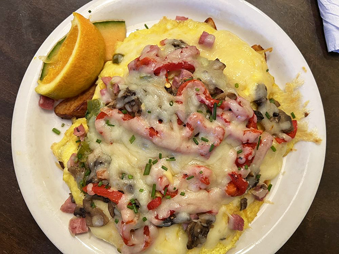 This omelet doesn't just contain ingredients&mdash;it showcases them under a melty cheese spotlight on breakfast's center stage.
