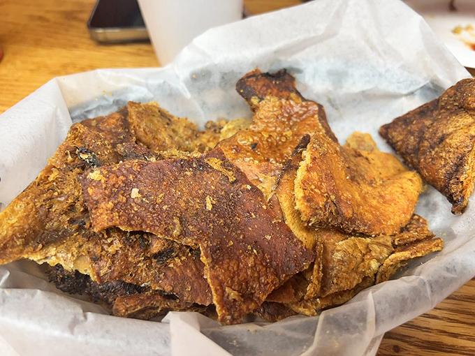 Pork skins that look like edible stained glass windows. Each amber-hued piece contains the concentrated essence of porky perfection.
